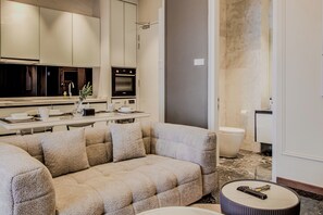 Suite Executiva, 2 quartos, varanda, Vista para a cidade | Sala de estar