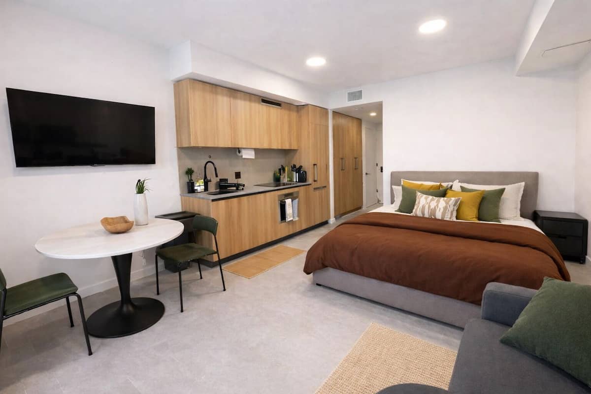 Suite-Estúdio Deluxe, varanda, Vista para a cidade | Sala de estar