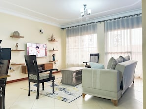 Apartamento, varanda, Vista para a cidade | Sala de estar