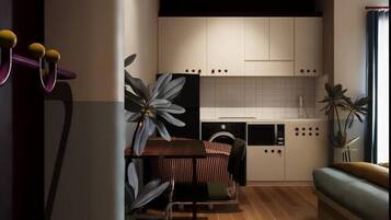 Estúdio Premium, kitchenette | Secretária, secretária adequada para computadores portáteis