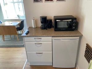 Apartamento Clássico, vista para o jardim | Interior