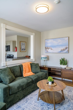 Apartamento família, cozinha, vista para a cidade | Vista do quarto