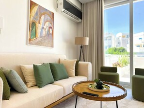 Apartamento, 2 quartos, terraço | Área de estar