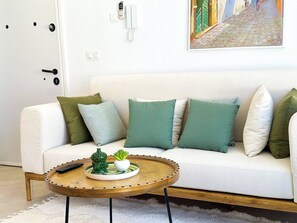 Apartamento, 2 quartos, terraço | Área de estar