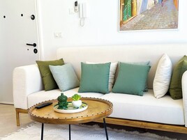 Apartamento, 2 quartos, terraço | Sala de estar