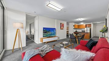 Apartamento standard, 3 quartos, sacada | Área de estar