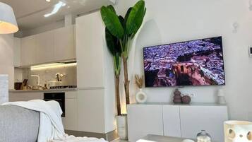 Apartamento, 1 quarto | Área de estar