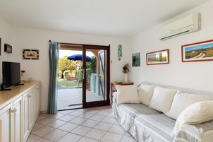 Apartamento, 2 quartos | Área de estar