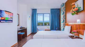 Quarto Triplo Deluxe, vista para o mar | Vista do quarto