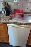 Estúdio básico, varanda, vista para o jardim | Cozinha privada