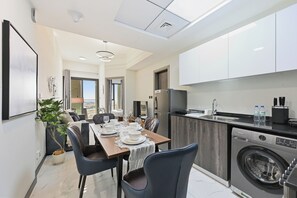 Apartamento, varanda | Cozinha privada