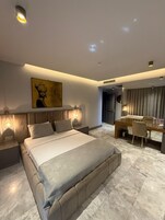 Quarto casal luxo, vista para o jardim