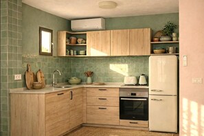 Apartamento, varanda | Cozinha privada