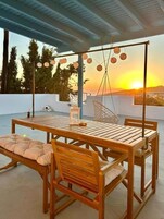 Apartamento Deluxe, cozinha, vista para o mar | Refeições ao ar livre