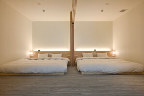 Apartamento superior | Cofres nos quartos, ferros/tábuas de passar roupa, Wi-Fi de cortesia