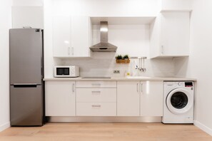 Apartamento luxo, vista para a cidade | Cozinha privada