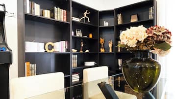 Apartamento superior, vista para a cidade | Parte interna