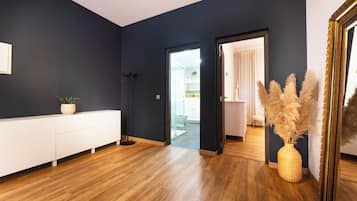 Apartamento superior, vista para a cidade | Parte interna