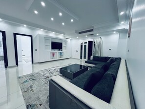 Villa Deluxe, vista para o jardim | Sala de estar