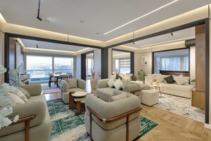 Apartamento Comfort, vista para o rio | Sala de estar