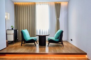 Suíte luxo, vista para a cidade | Parte interna