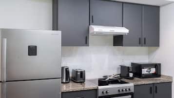 Apartamento superluxo, sacada, vista para a cidade | Cozinha privada