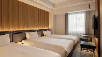 Quarto, 3 camas de solteiro, vista para a cidade