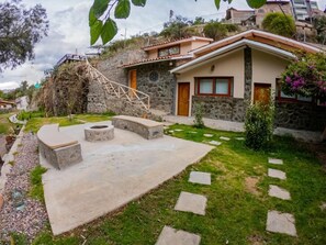 Bangalô, varanda, vista para o jardim | Área da propriedade