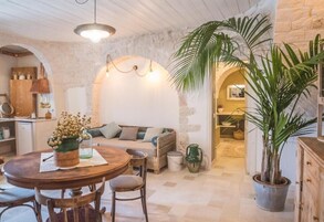 Apartamento luxo, vista para o resort | Área de estar