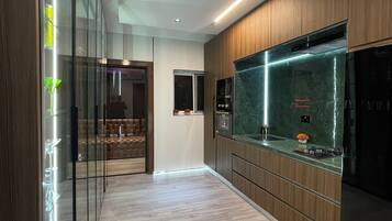 Apartamento, 1 quarto, pátio | Cozinha privada | Uma cafeteira/bule, uma chaleira elétrica