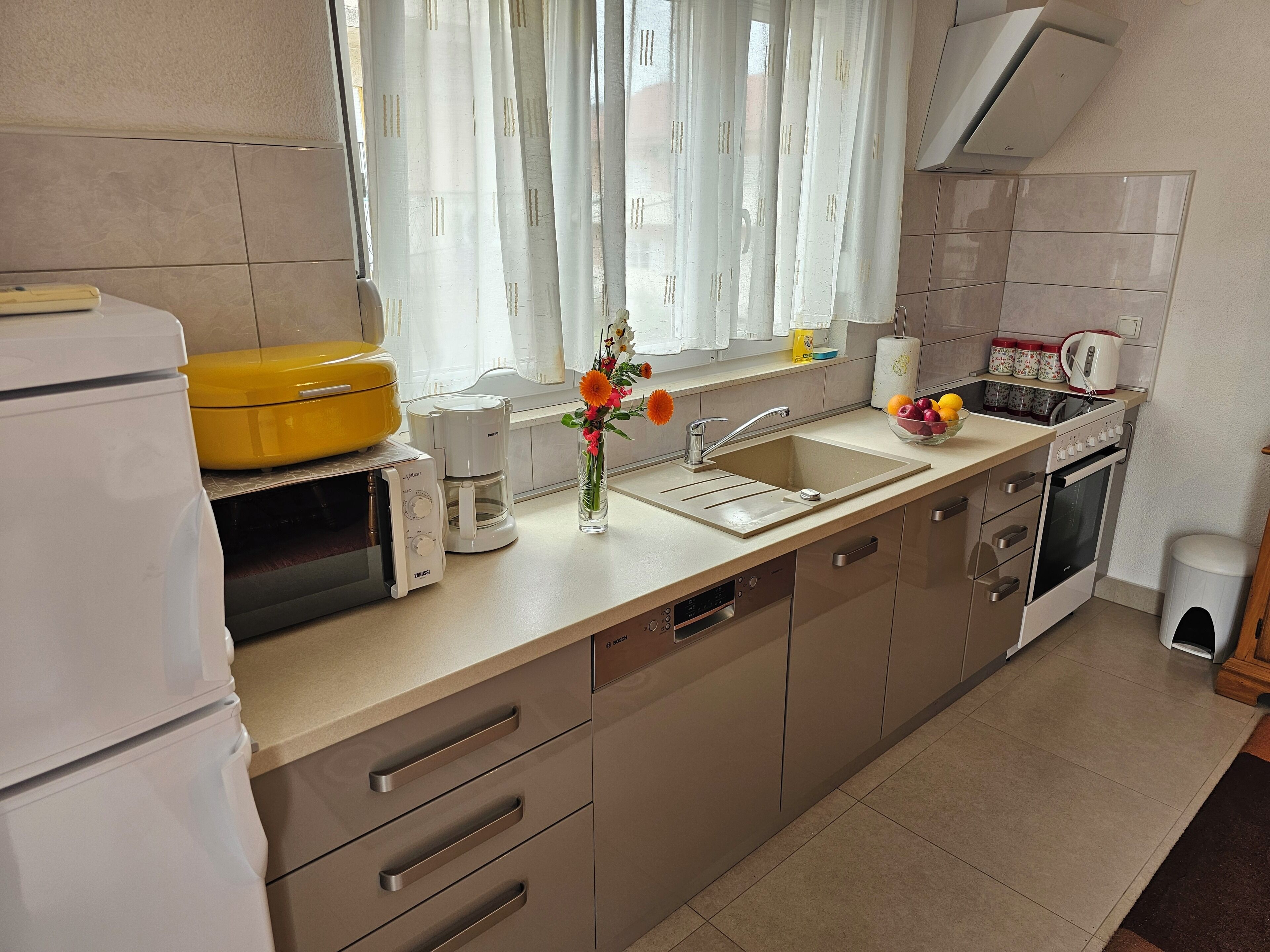 Apartamento, varanda | Cozinha privada
