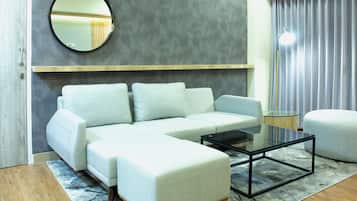 Quarto luxo, vista para o mar | Área de estar