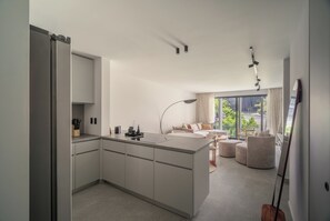 Suíte superior, 2 quartos, sacada | Cozinha privada