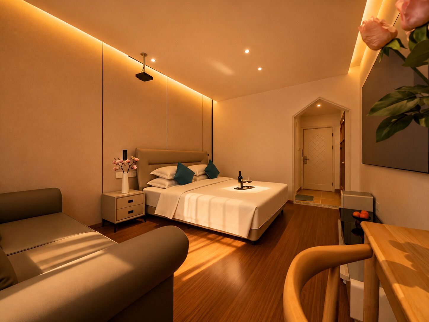 Um quarto moderno com cama, mesas de cabeceira, um criado-mudo, um sofá e uma escrivaninha de madeira.