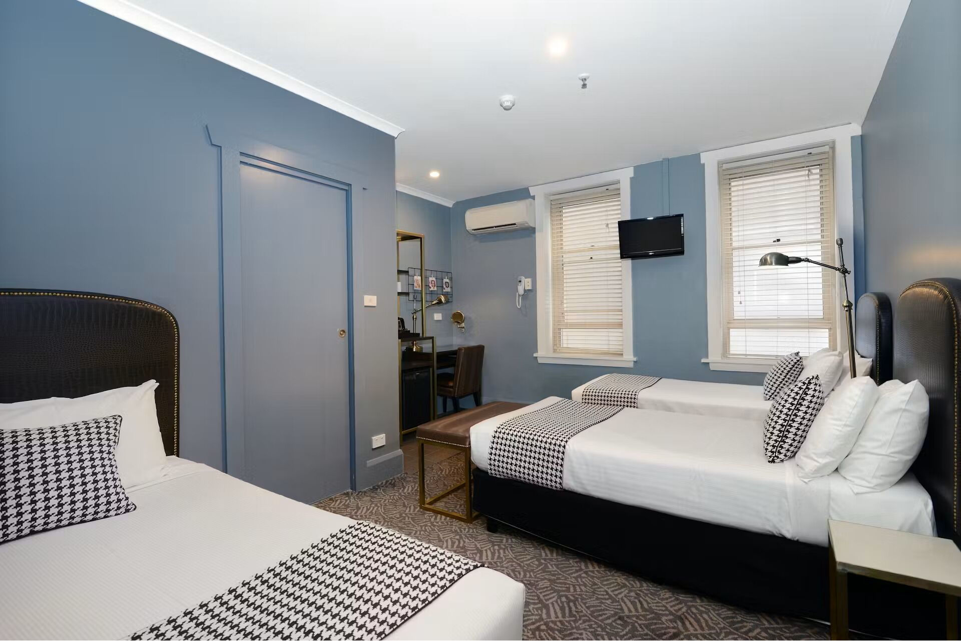 Quarto triplo executivo