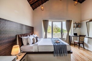 Villa Deluxe, varanda, vista para o jardim | Ferro/tábua de engomar, Wi-fi grátis