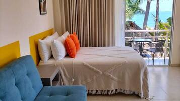 Quarto Quádruplo Standard, varanda, vista para o oceano