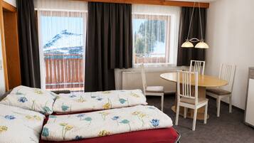 Apartamento conforto, 2 quartos | 4 quartos, roupa de cama