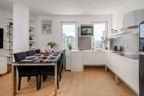 Apartamento Comfort, varanda, Vista para a cidade | Cozinha privada