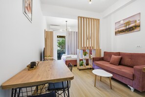 Apartamento conforto, sacada | Área de estar
