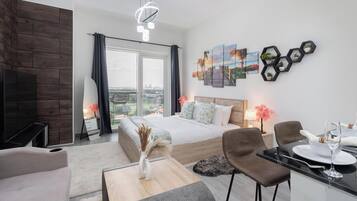 Estúdio superluxo, sacada, vista para a cidade | Área de estar