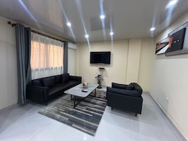 Apartamento luxo | Área de estar | Smart TV