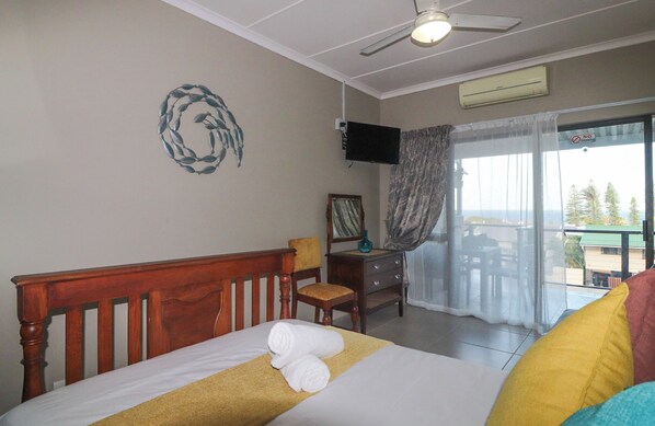 Apartamento família, vista para o mar | Roupas de cama premium, Wi-Fi de cortesia, individualmente decorados