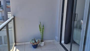 Apartamento, 2 quartos, pátio | Varanda