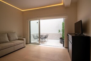 Apartamento Premium, 1 cama king-size e sofá-cama | Sala de estar