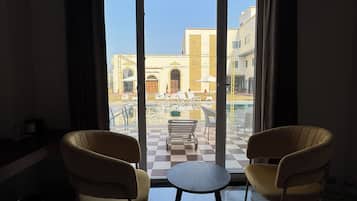 Quarto casal executivo, vista para a piscina | Parte interna