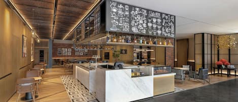 Uma área de bar moderna com balcão de mármore, assentos e uma parede decorativa com ilustrações sobre café.