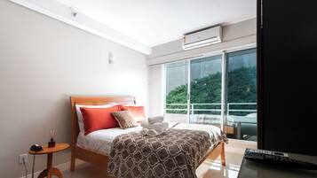 Apartamento Design, Vista para a cidade | Comodidade do quarto