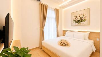 Quarto casal luxo, vista para a cidade