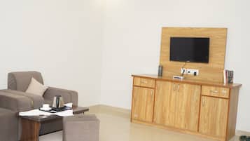 Quarto Duplo Deluxe | Sala de estar